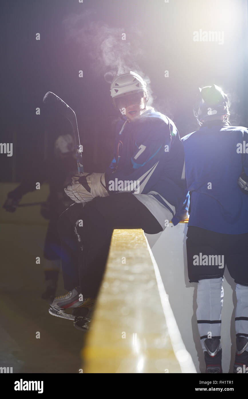 ice hockey players on bench Stock Photo - Alamy