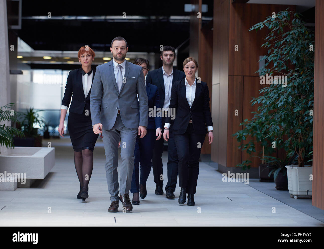 business people team walking Stock Photo - Alamy