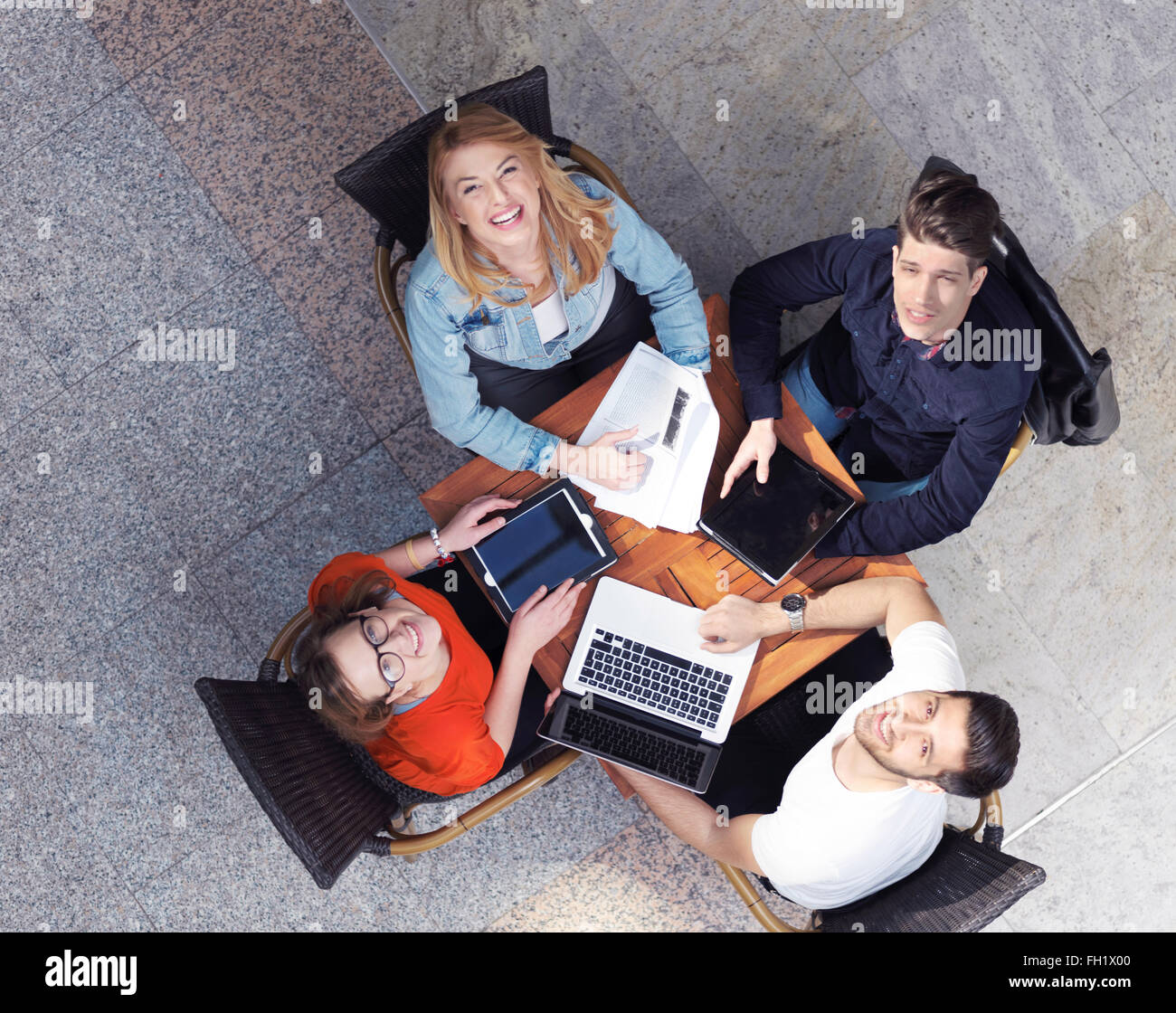 students group working on school project together Stock Photo - Alamy