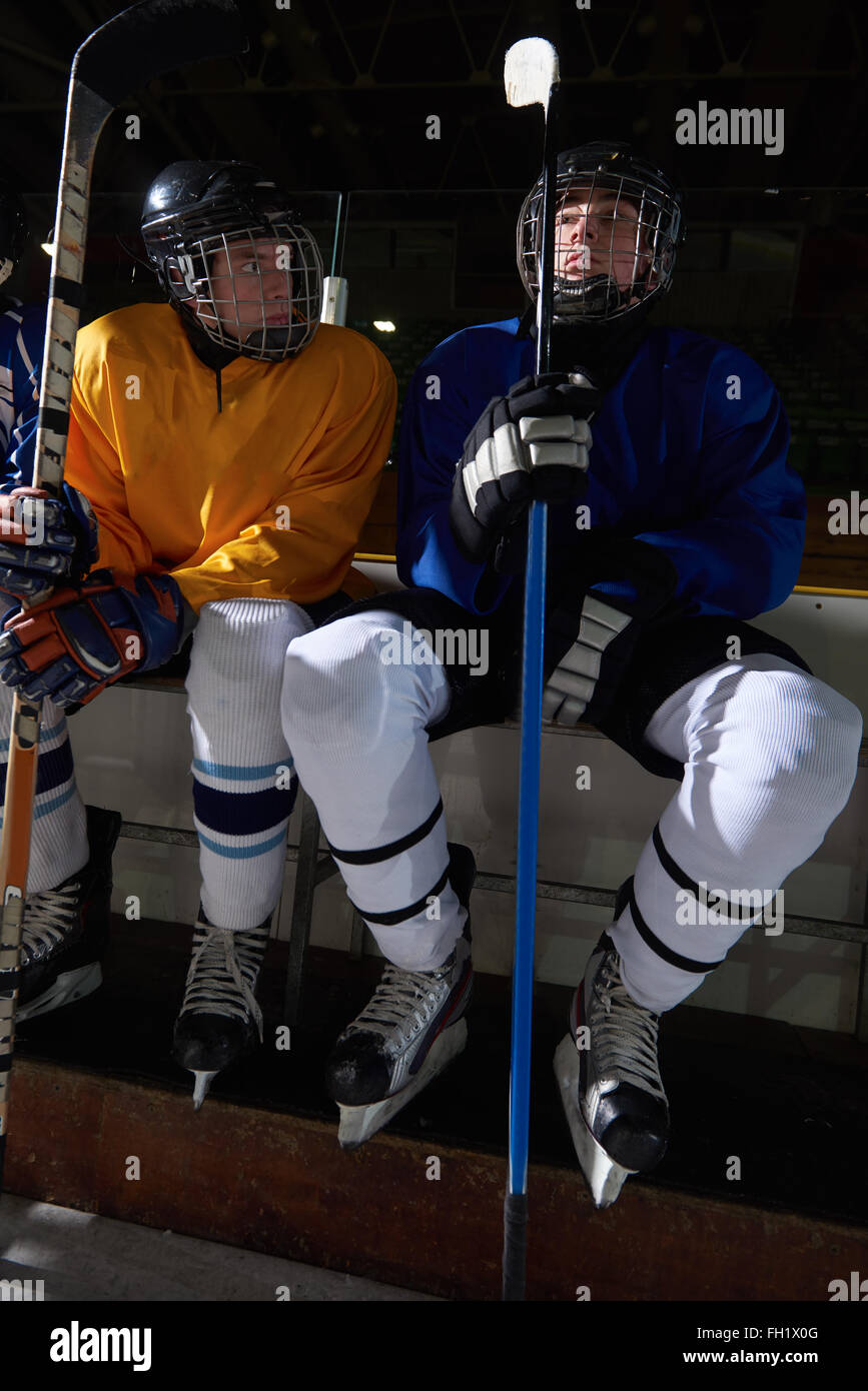 ice hockey players on bench Stock Photo - Alamy