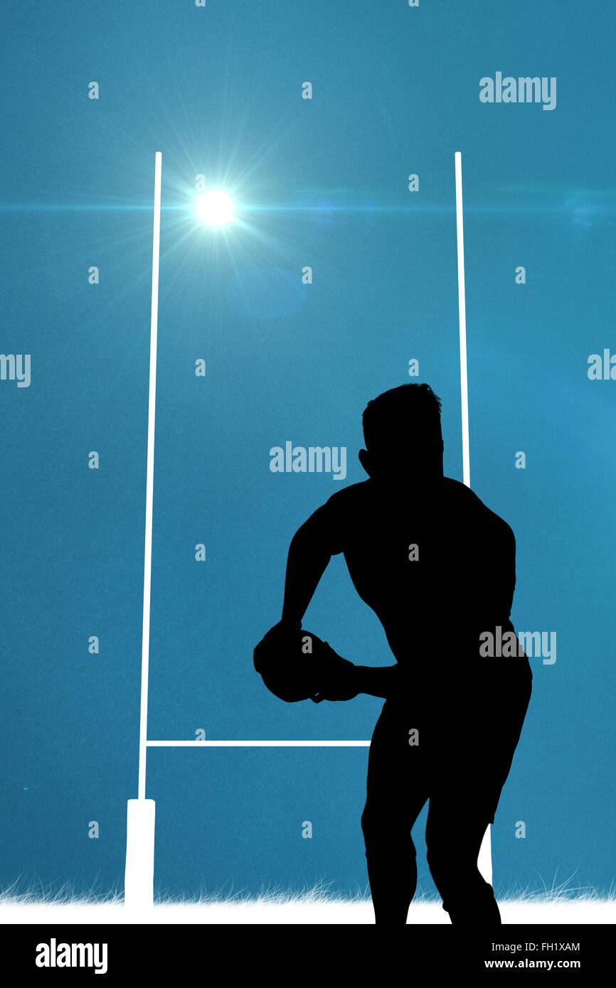 Composite image of silhouette of rugby player Stock Photo - Alamy