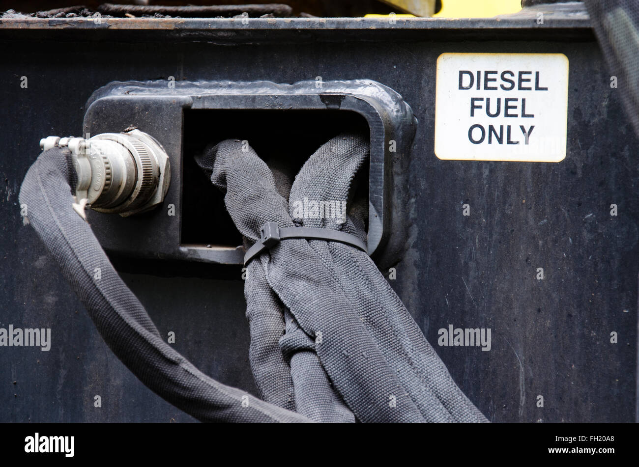A diesel fuel only warning sign on heavy machinery Stock Photo - Alamy