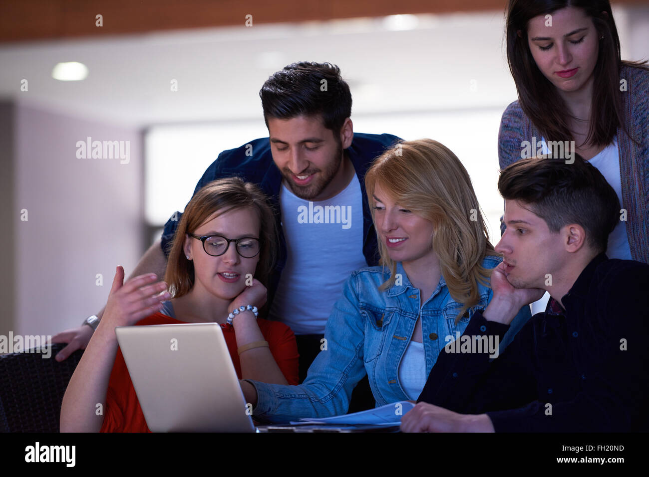 students group working on school project together Stock Photo - Alamy