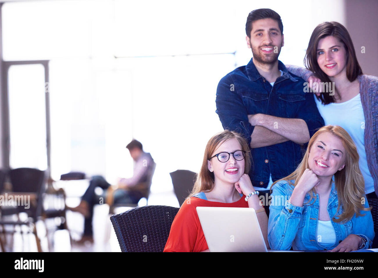 students group standing together as team Stock Photo - Alamy