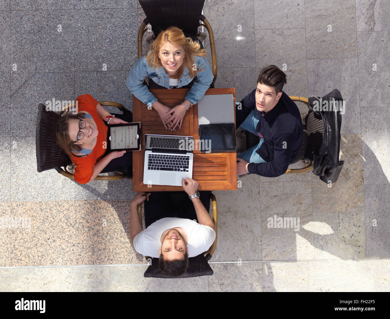 students group working on school project together Stock Photo - Alamy