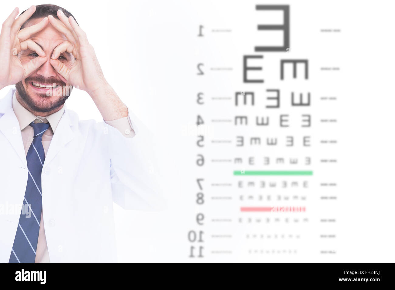 Composite image of smiling doctor forming eyeglasses with his hands ...