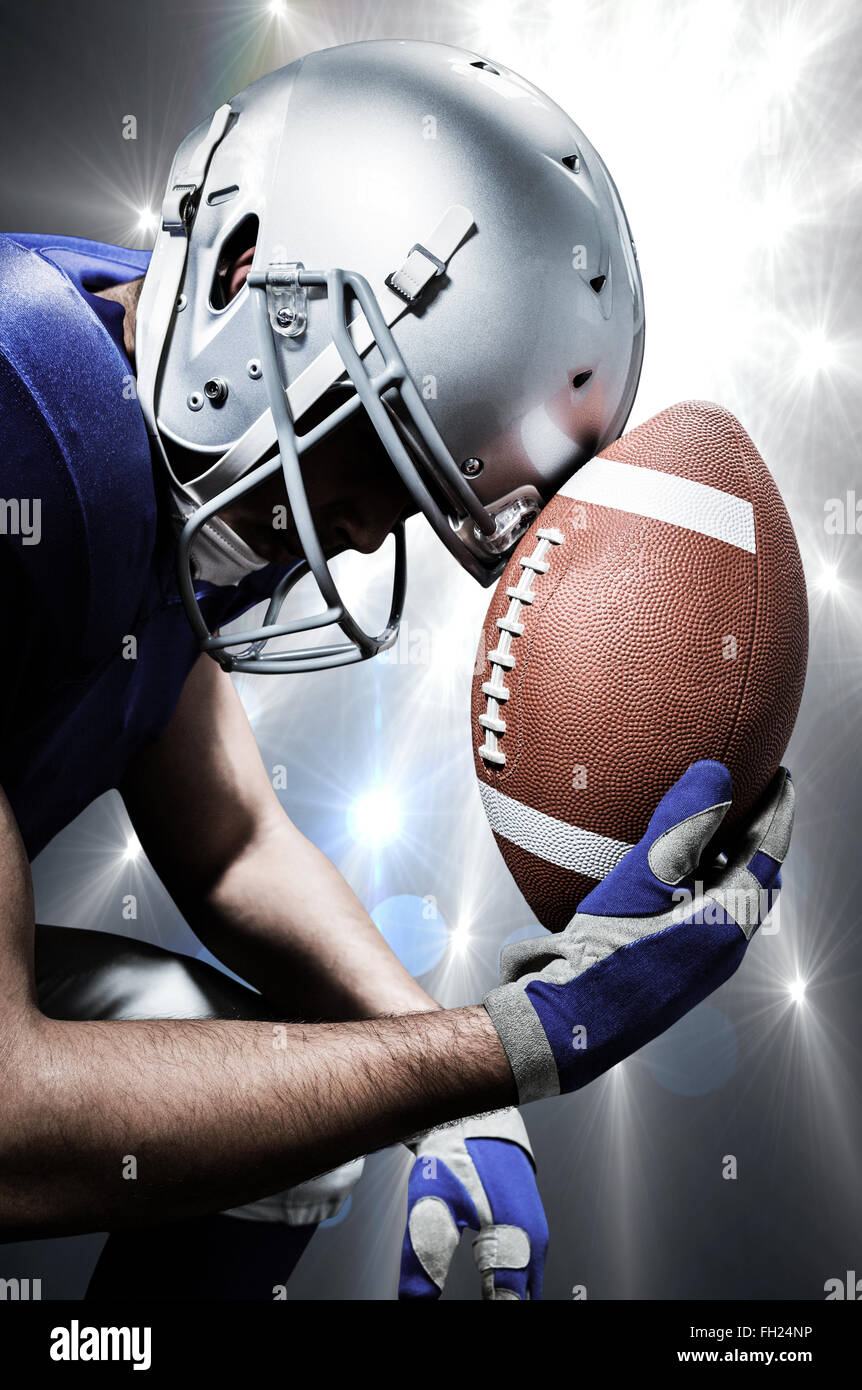 Composite image of close-up of upset american football player with ball ...