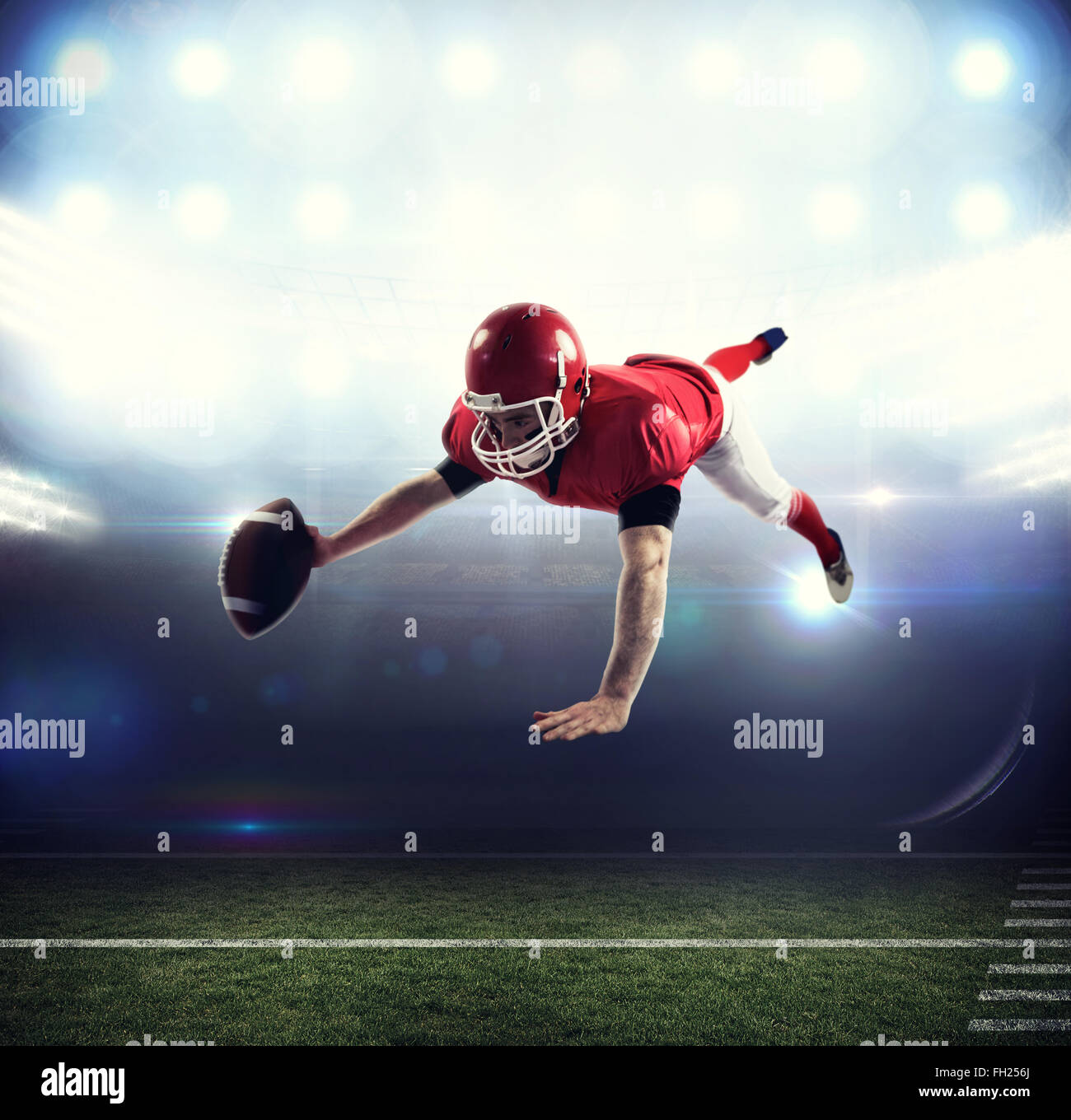 Composite image of american football player reaching football Stock ...