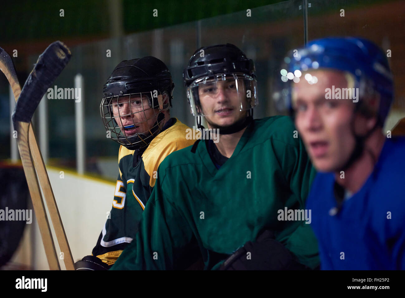 ice hockey players on bench Stock Photo - Alamy