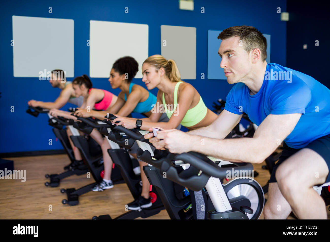 Fit people in a spin class Stock Photo - Alamy