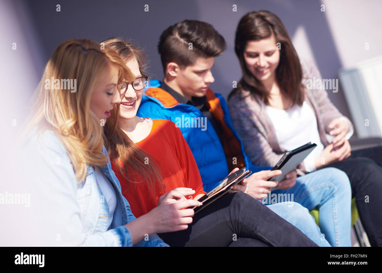 students group working on school project together Stock Photo - Alamy