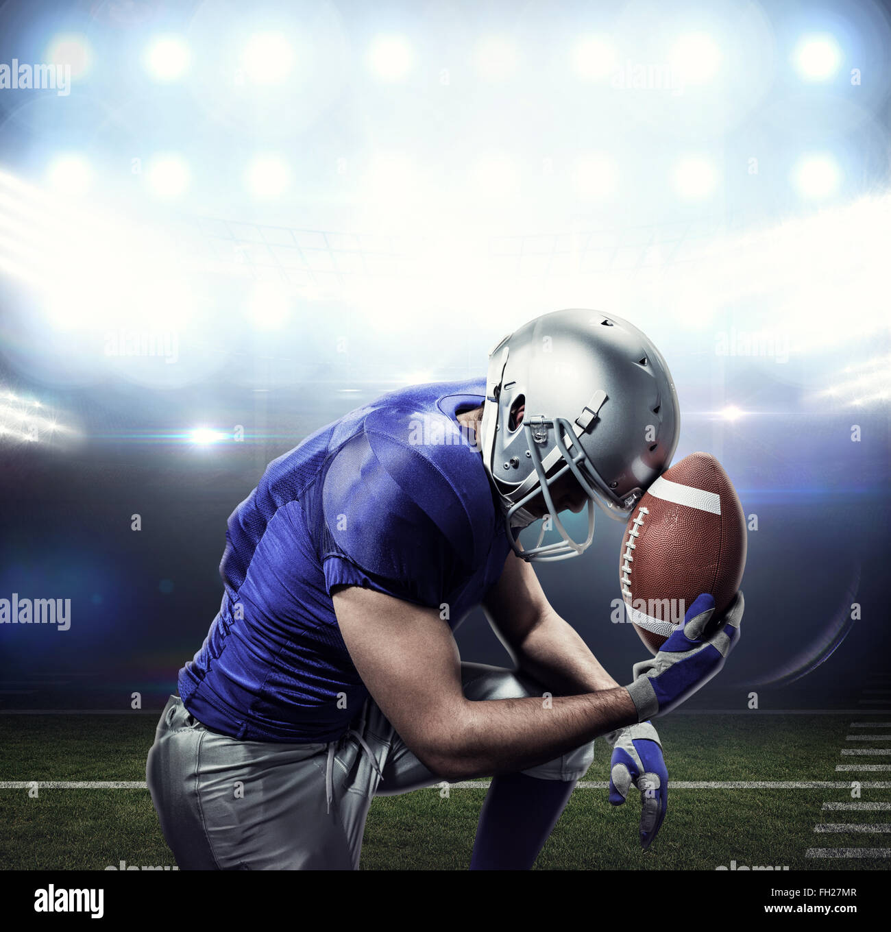 Composite image of upset american football player with ball Stock Photo ...