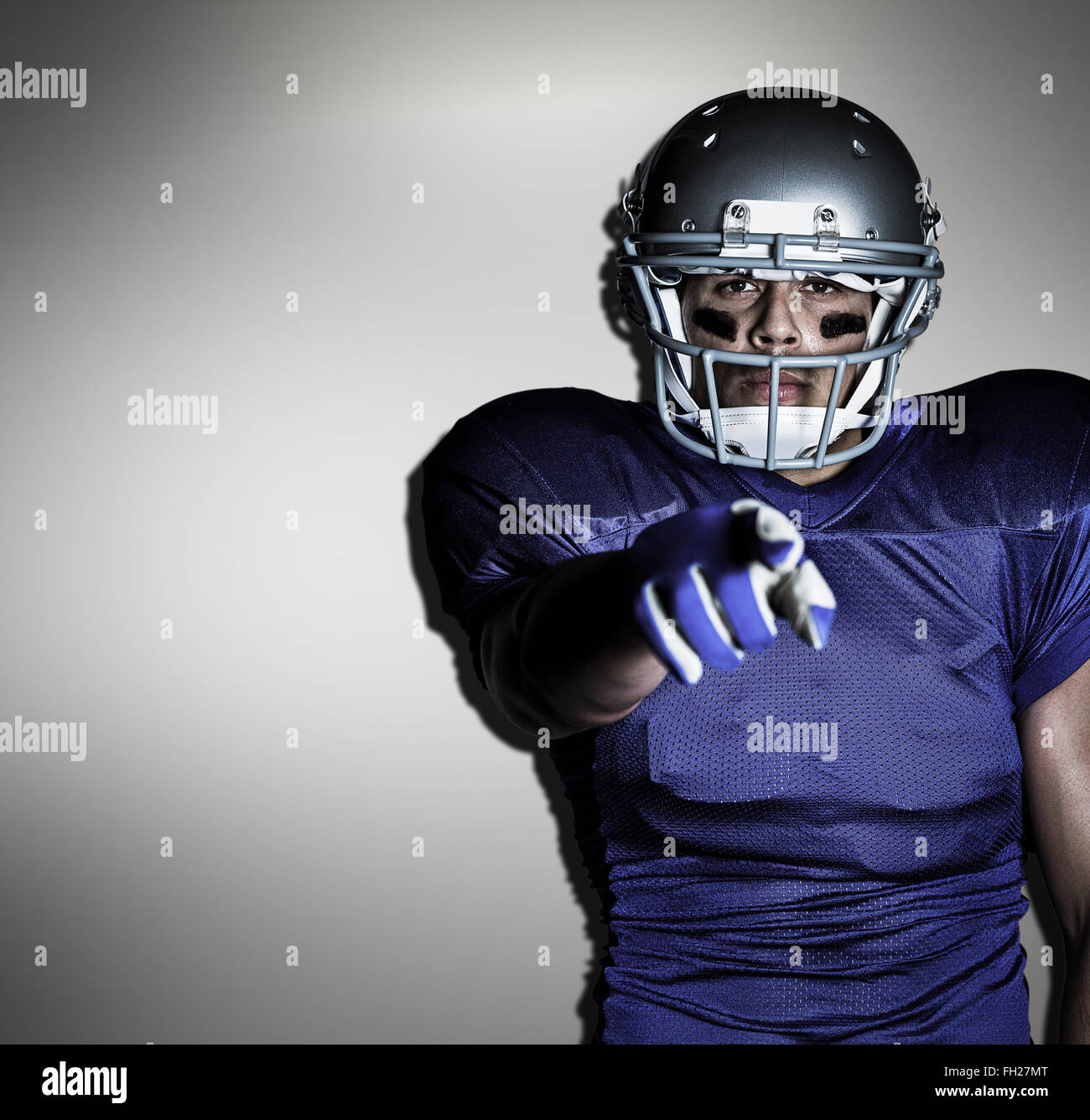 Composite image of portrait of american football player pointing Stock ...
