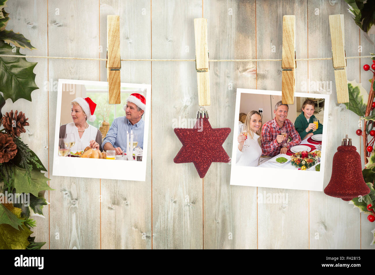 Composite image of hanging christmas photos Stock Photo - Alamy