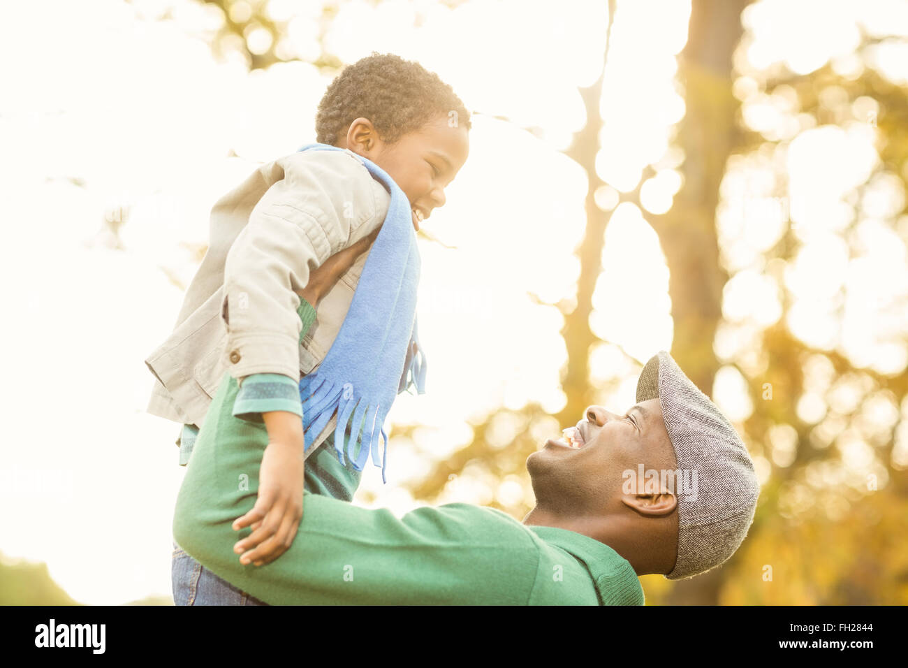 Young father holding his son Stock Photo - Alamy