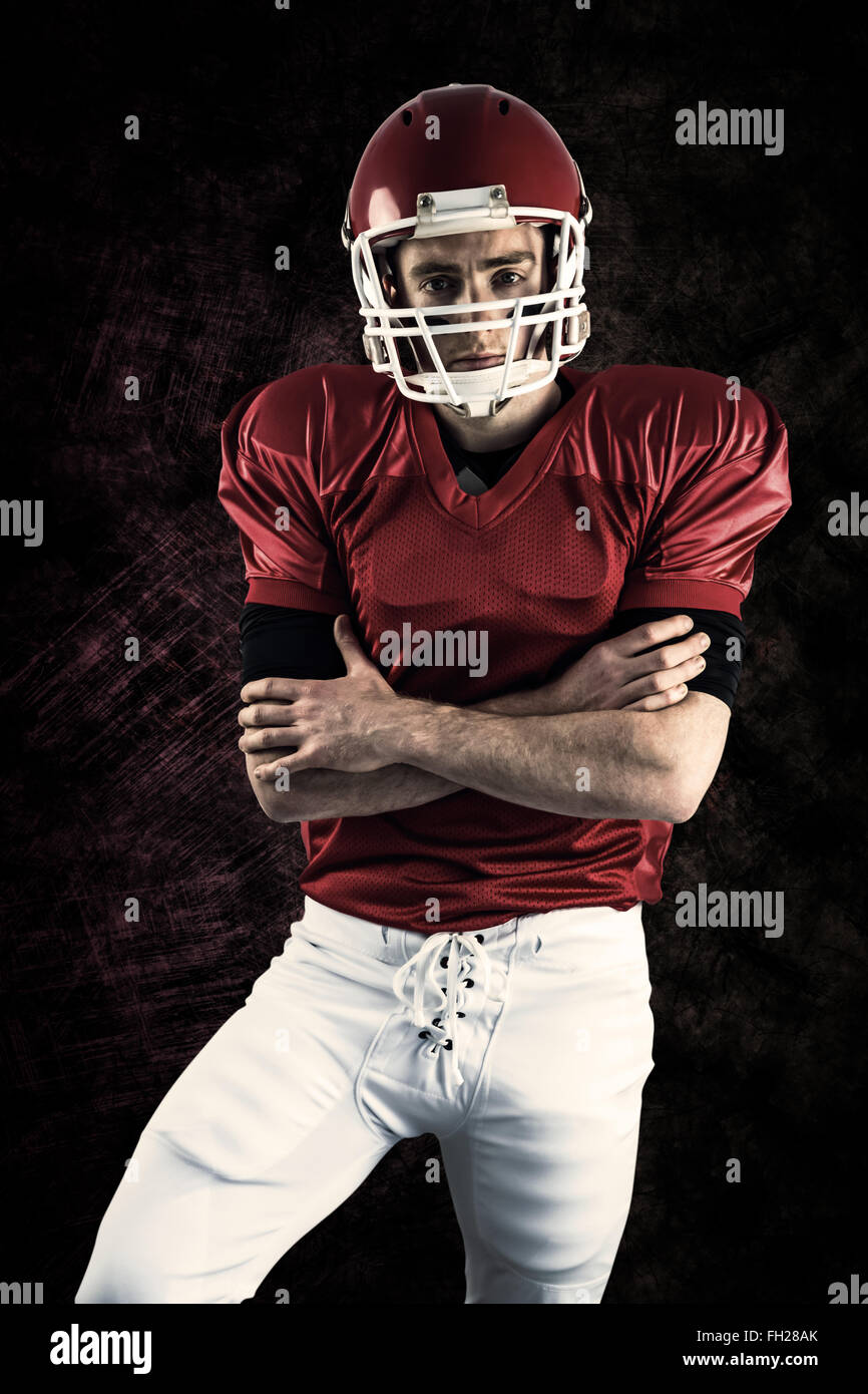 Composite image of portrait of serious american football player with ...