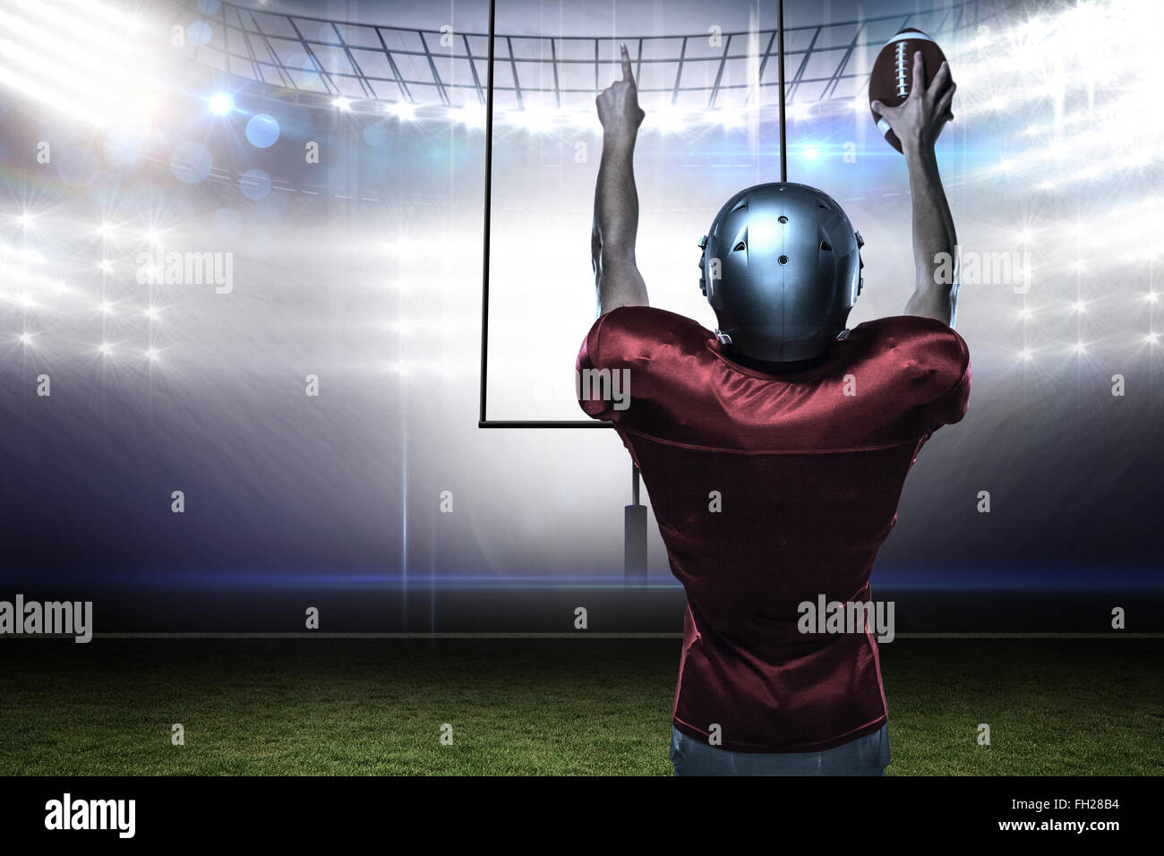 Male football player arms raised hi-res stock photography and images ...