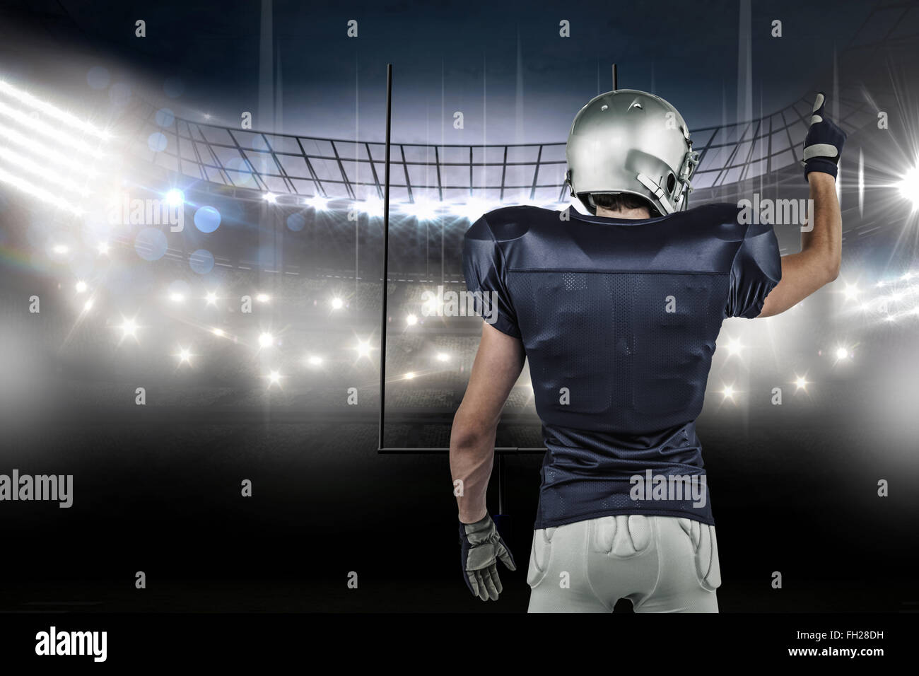Composite image of rear view of american football player pointing Stock ...