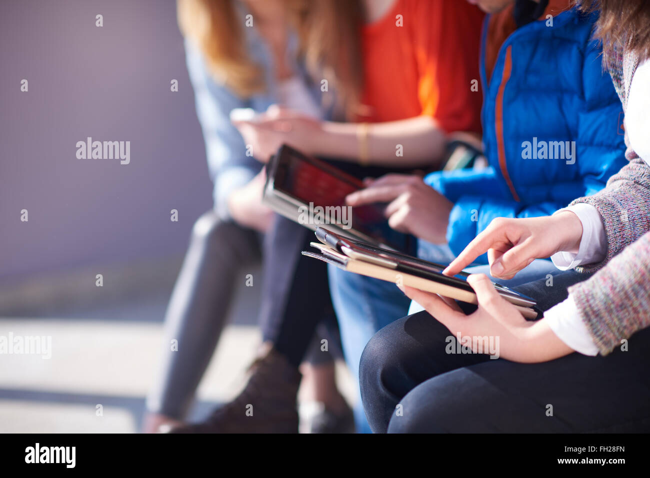 students group working on school project together Stock Photo - Alamy