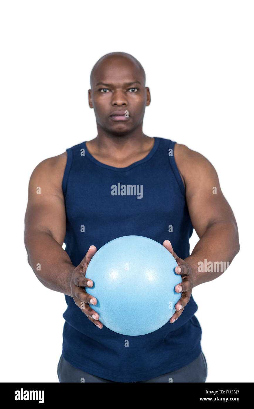 Muscular man working out with weight Stock Photo - Alamy