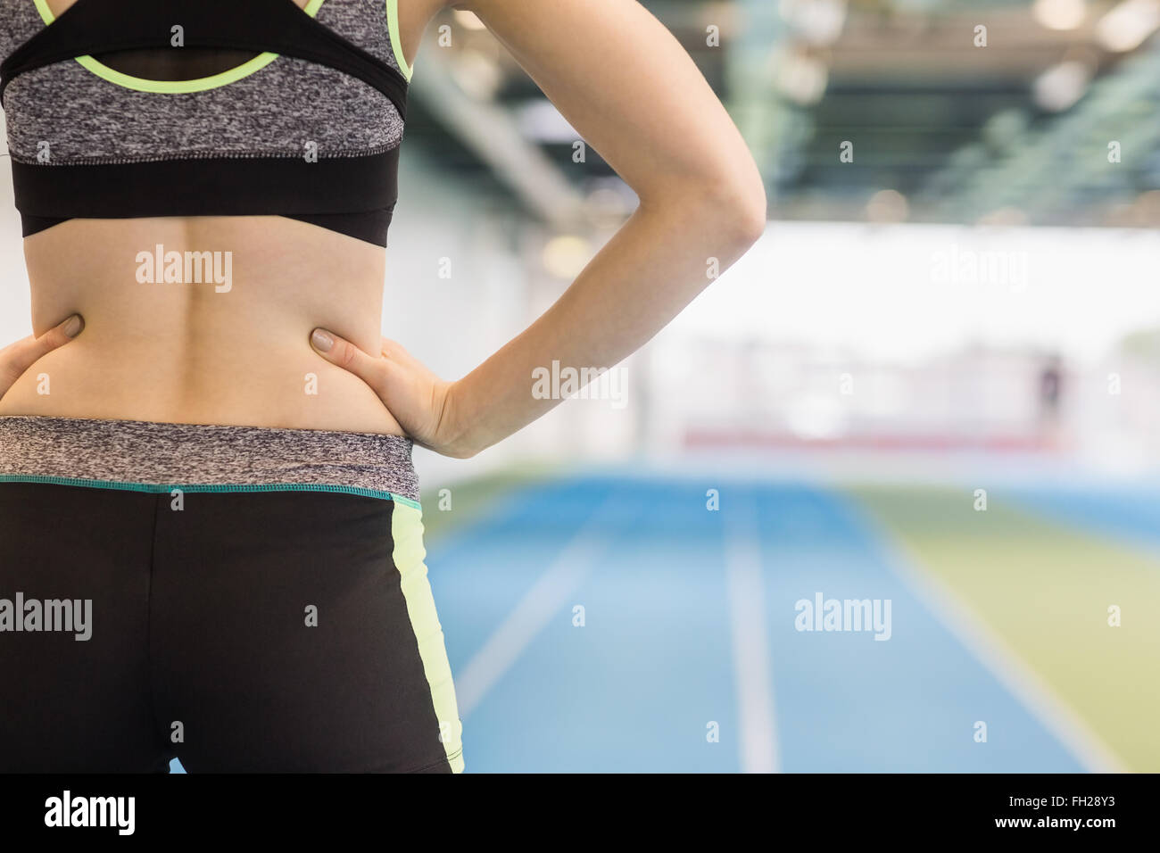 Fit woman on the running track Stock Photo - Alamy