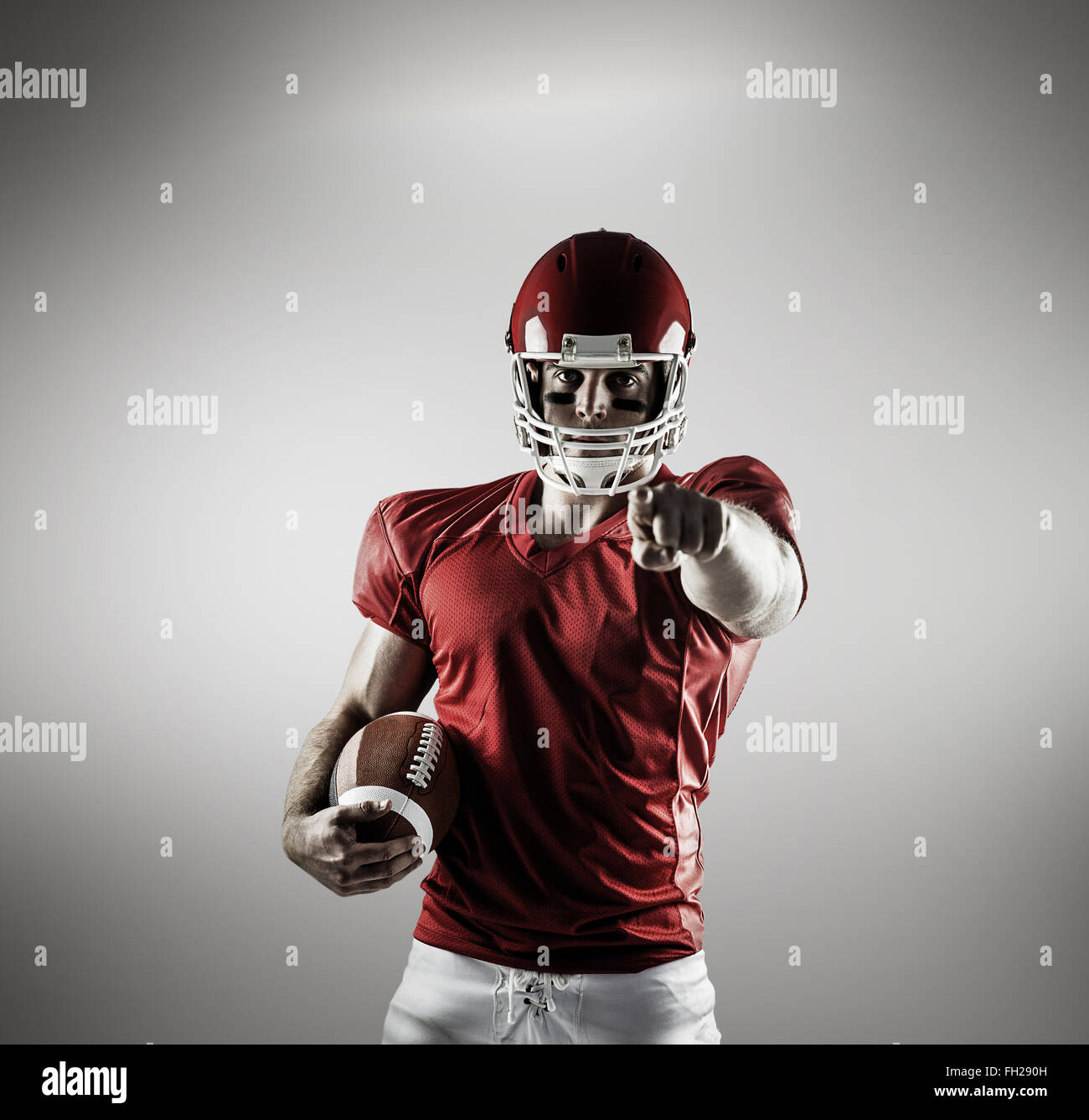 Composite image of american football player pointing at camera Stock ...