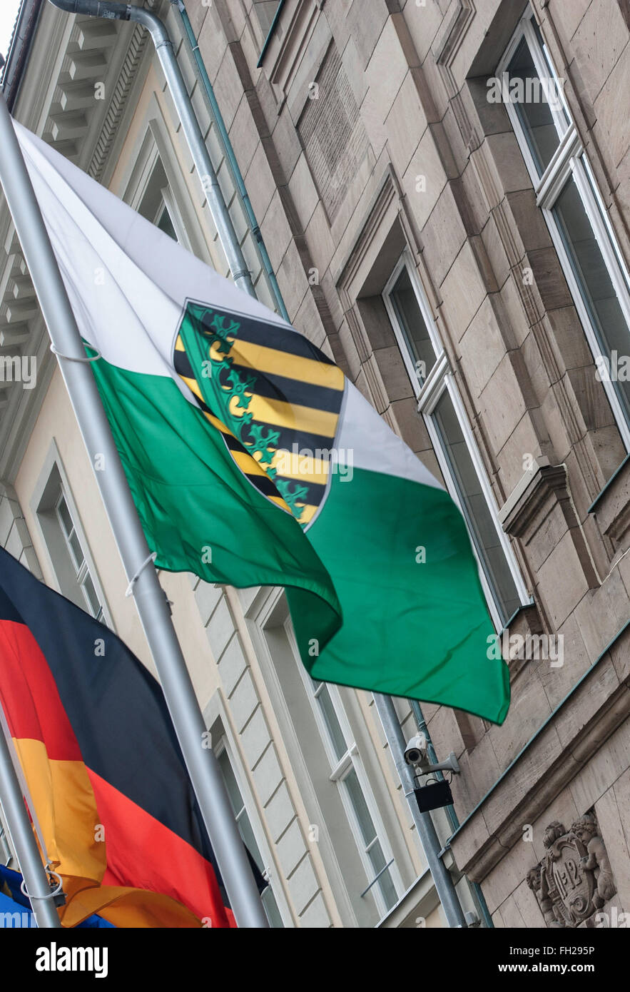 The Saxon state flag (R-L) and the German national flag pictured in ...