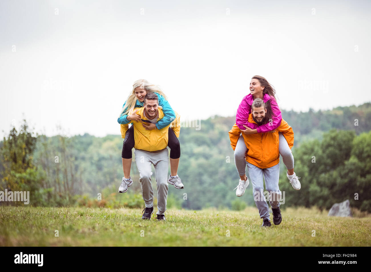 Carrying a friend on shoulders hi-res stock photography and images - Alamy