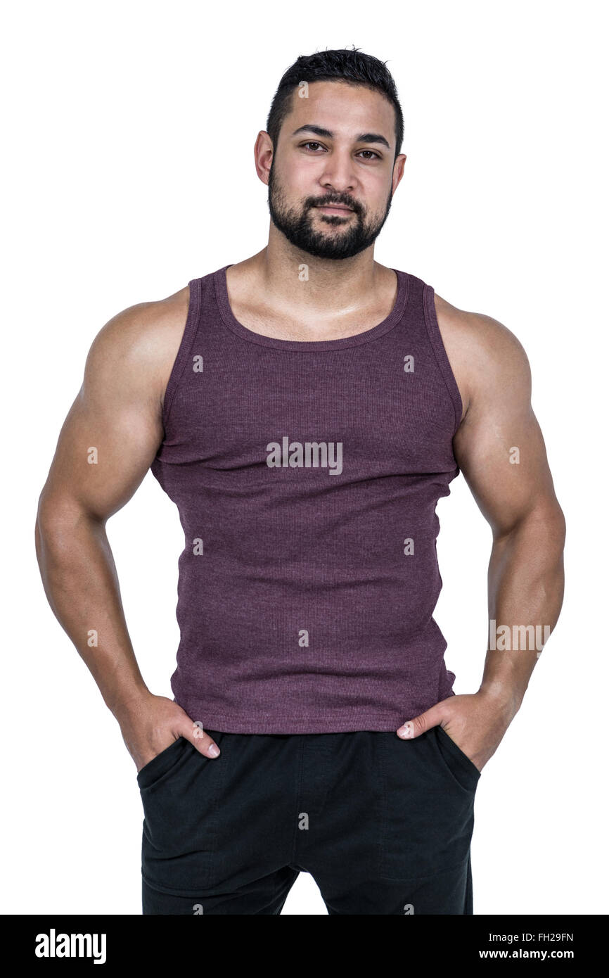 Muscular man looking at camera Stock Photo - Alamy