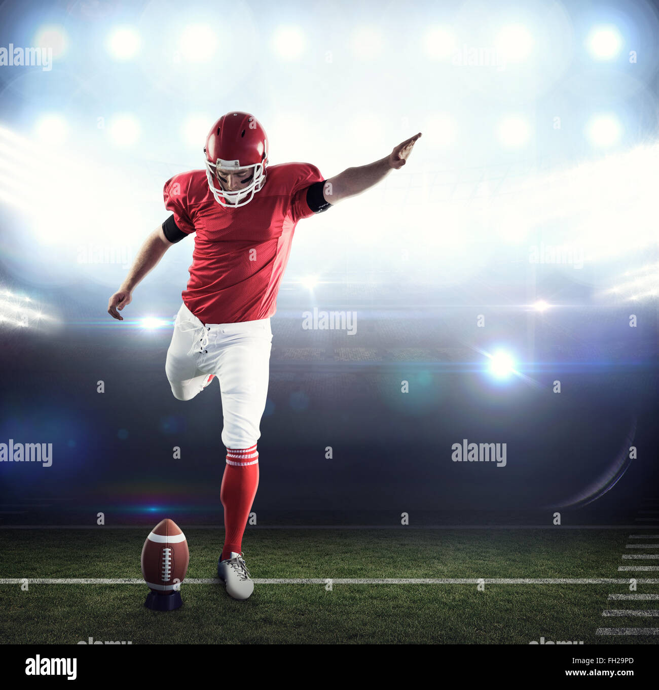 Composite image of american football player kicking football Stock ...
