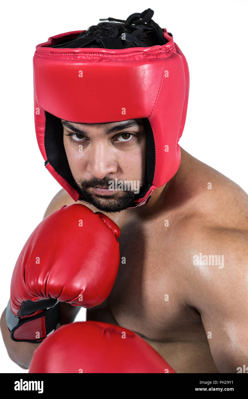 Muscular man boxing in gloves Stock Photo - Alamy