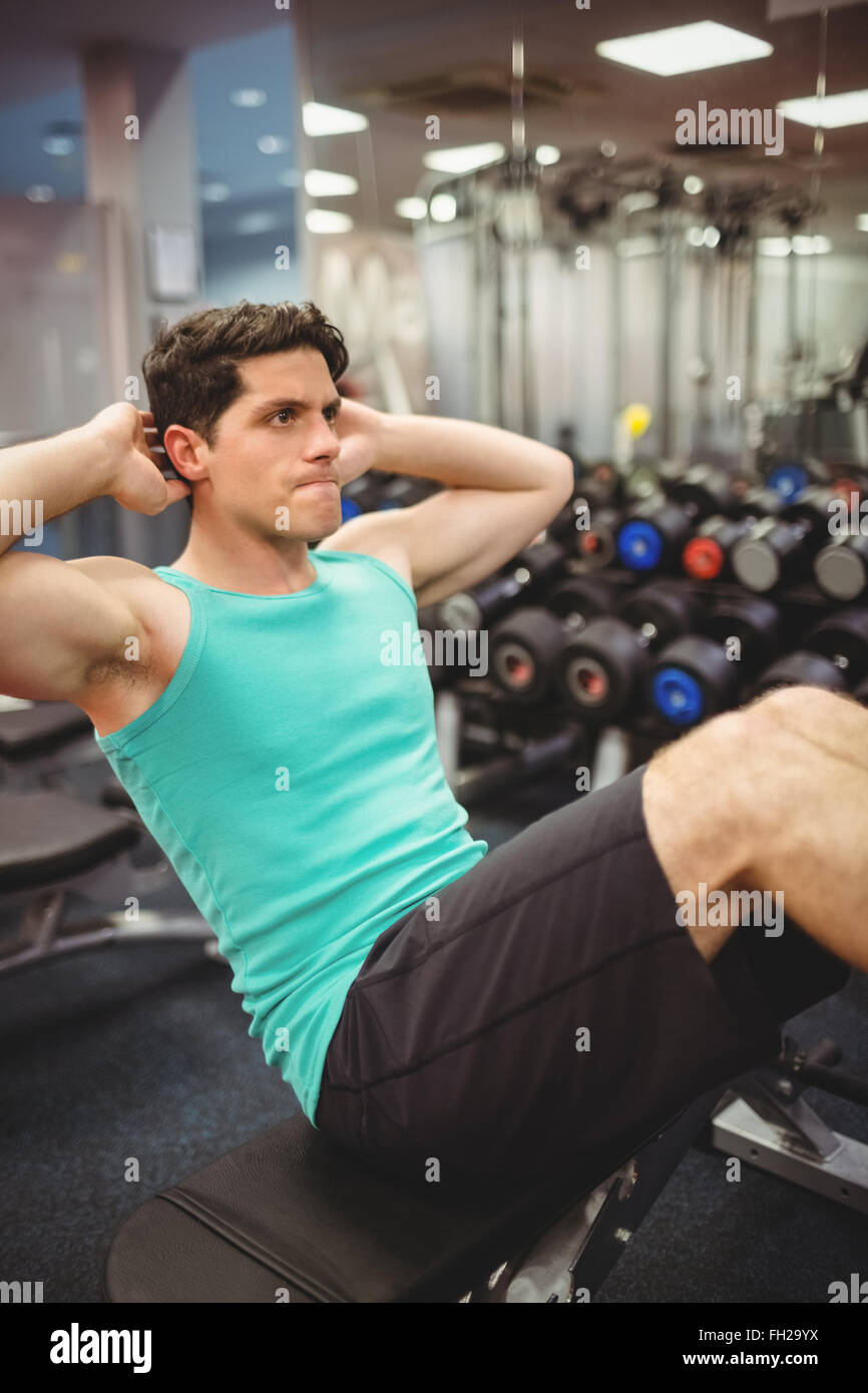 Fit man doing sit ups Stock Photo - Alamy