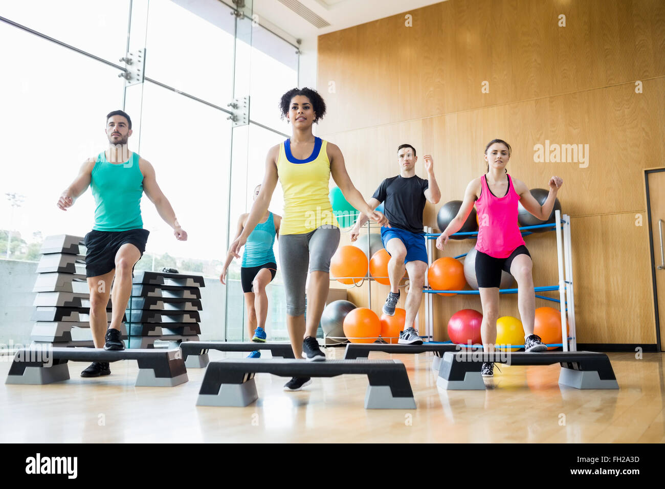 Fitness class exercising in the studio Stock Photo - Alamy