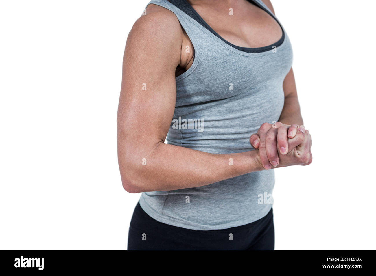 MId section of muscular woman flexing muscle Stock Photo - Alamy