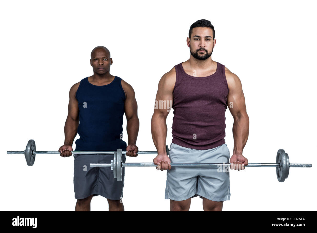 Man lifting barbell with trainer Stock Photo - Alamy