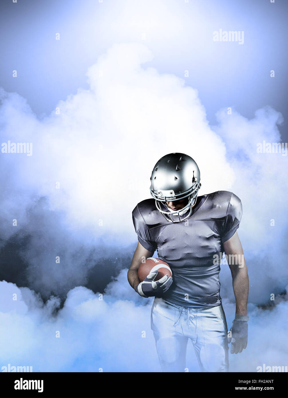 American football player looking down hi-res stock photography and ...