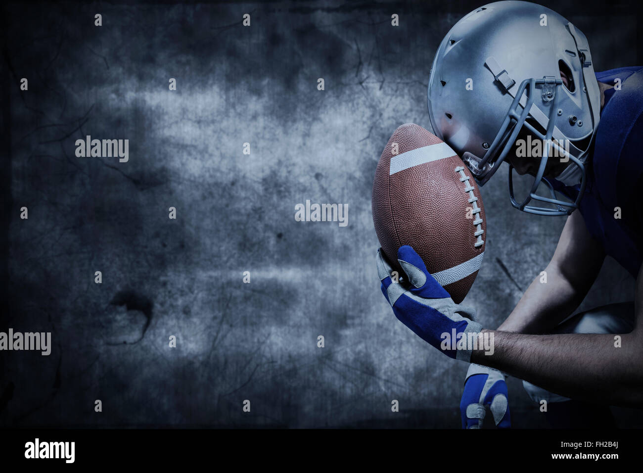 Composite image of close-up of upset american football player with ball ...