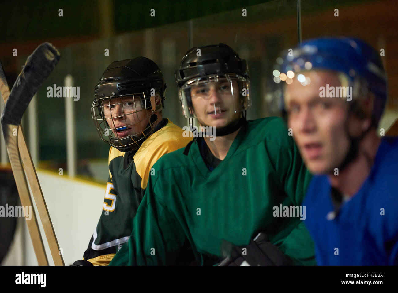 ice hockey players on bench Stock Photo - Alamy