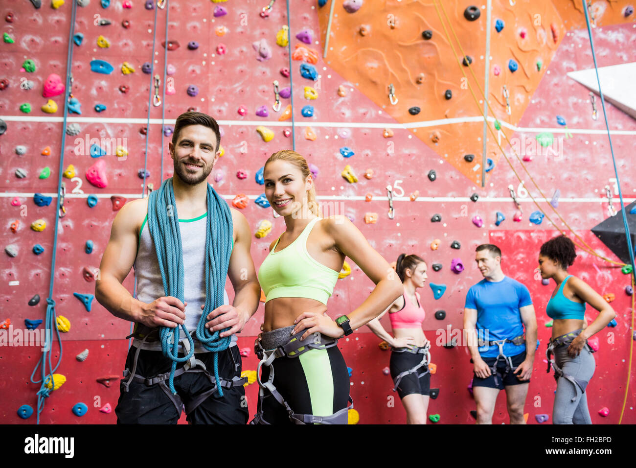 Fit people getting ready to rock climb Stock Photo - Alamy