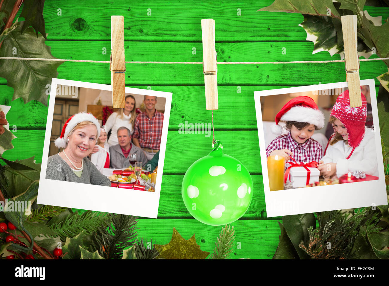 Composite image of hanging christmas photos Stock Photo - Alamy