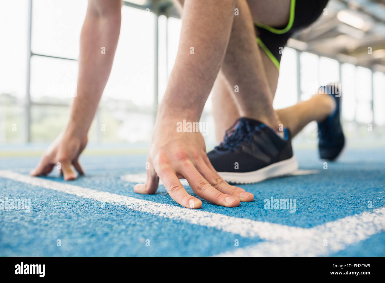 Crouched position hi-res stock photography and images - Alamy