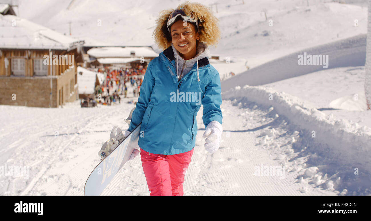 Pretty girl snowboarding hi-res stock photography and images - Alamy
