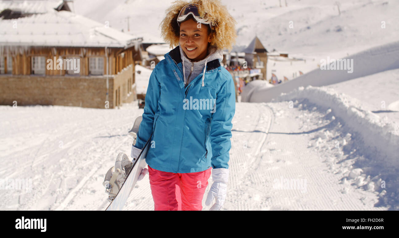 Pretty girl snowboarding hi-res stock photography and images - Alamy