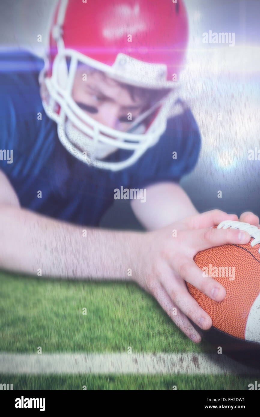 Composite image of american football player scoring a touchdown Stock ...