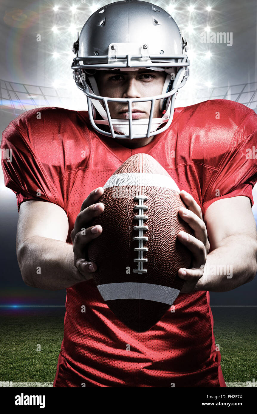 Composite image of portrait of determined american football player ...