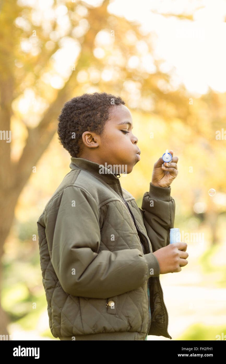 Little boy doing some bubbles Stock Photo - Alamy