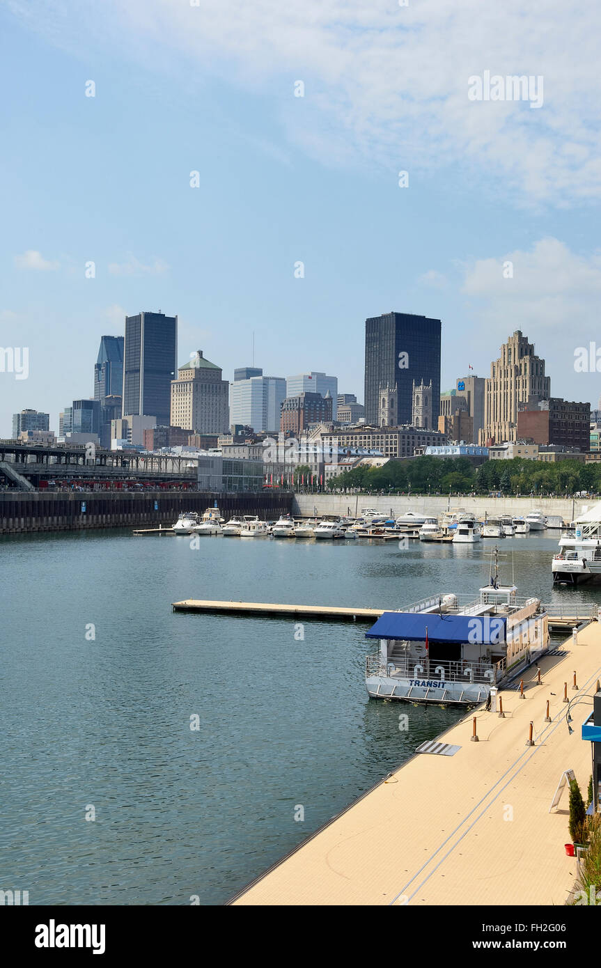View of downtown Montreal showing the port on the St. Lawrence River ...