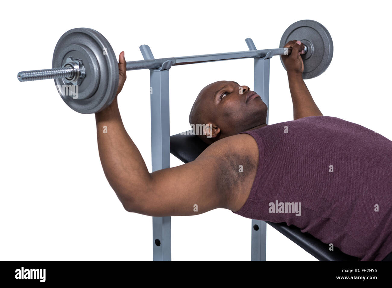 Fit man exercising with barbell Stock Photo - Alamy