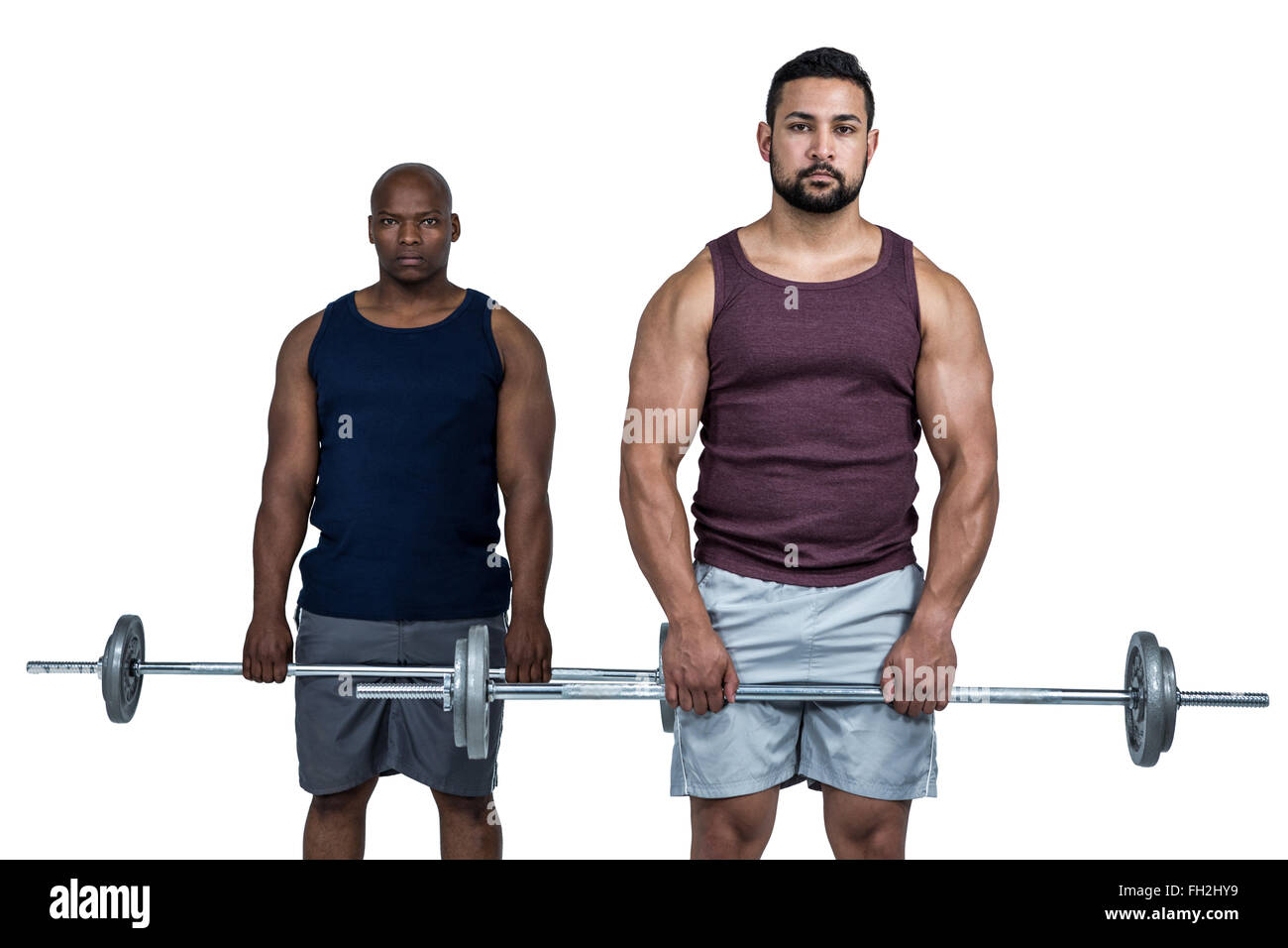 Man lifting barbell with trainer Stock Photo - Alamy