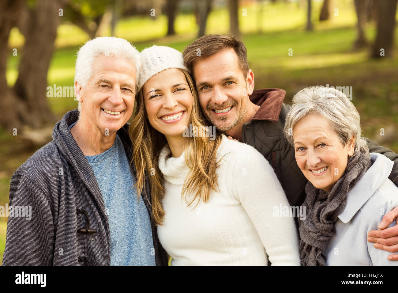 Portrait of a smiling family Stock Photo - Alamy
